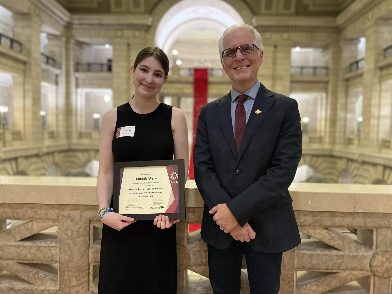 Hannah Wrba and The Honourable Nello Altomare, Minister of Education ...